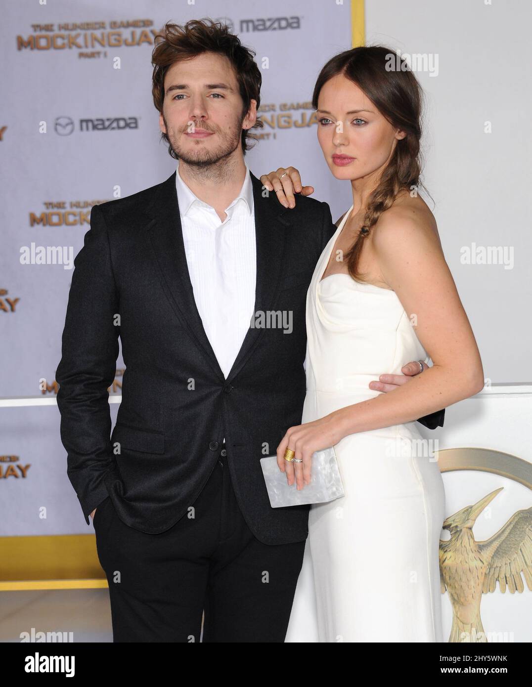 Sam Claflin & Laura Haddock attending "The Hunger Games: Mockingjay ...