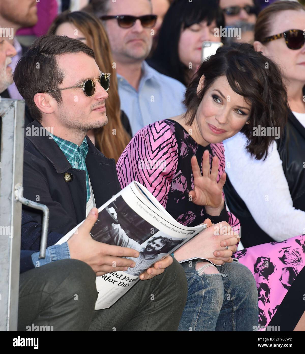 Elijah Wood and Evangeline Lilly attend the ceremony honoring Peter ...