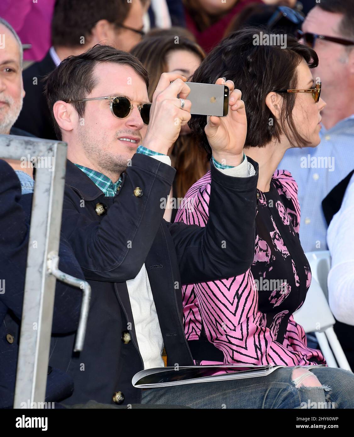 Elijah Wood and Evangeline Lilly attend the ceremony honoring Peter ...