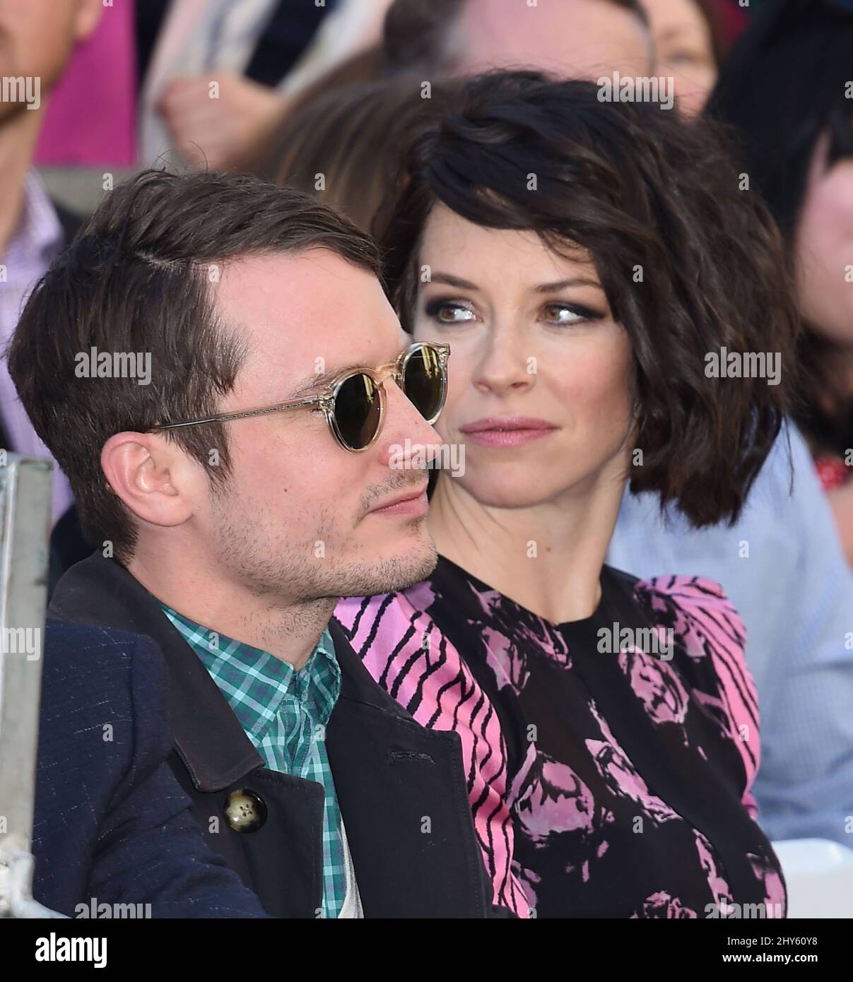 Elijah Wood and Evangeline Lilly attend the ceremony honoring Peter ...