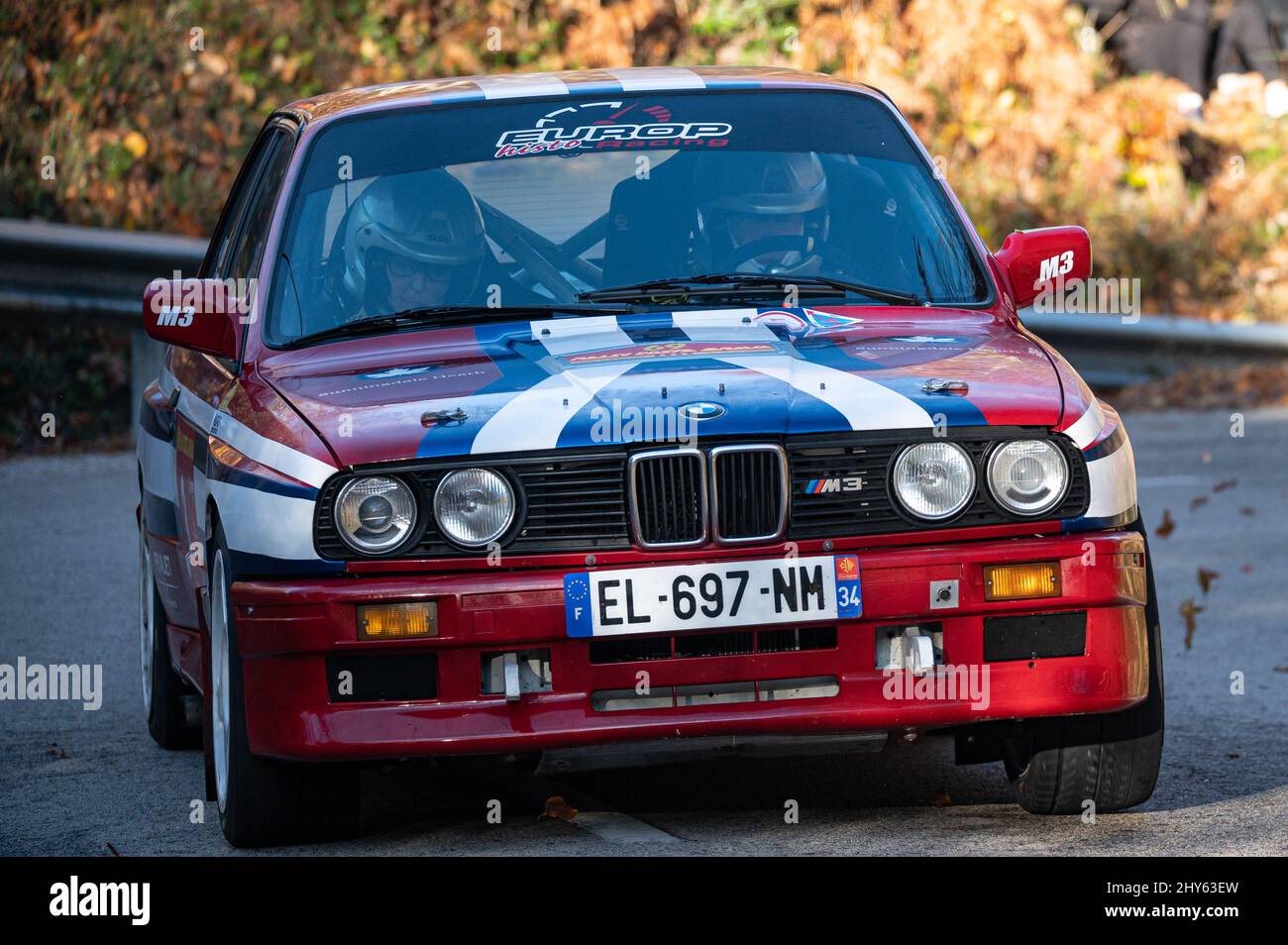 Red BMW E30 M3 rally car driving during the 69th Rally Costa Brava ...