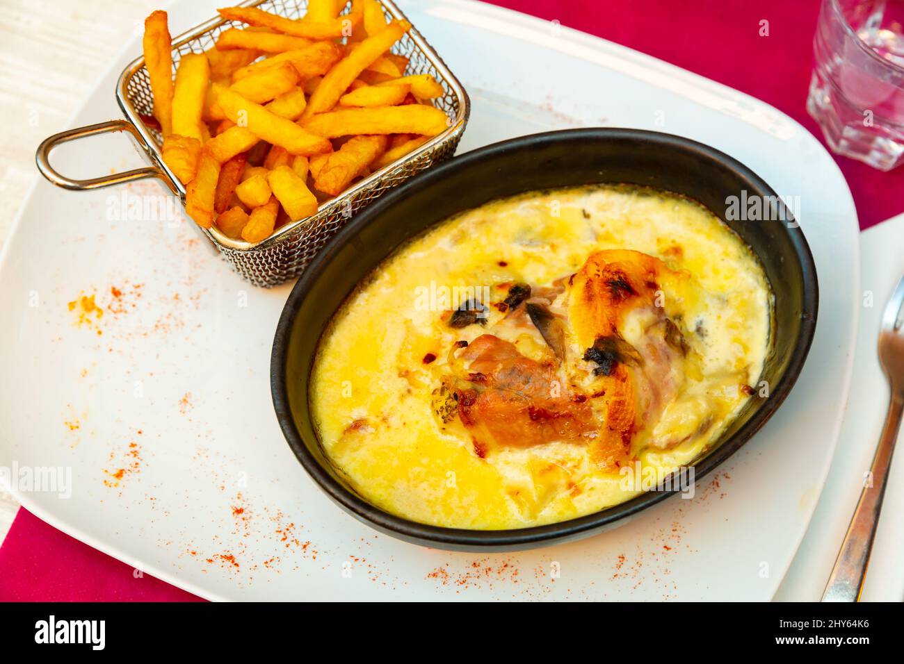 Savoyard chicken escalope with bacon, zucchini, cheese in creamy sauce ...