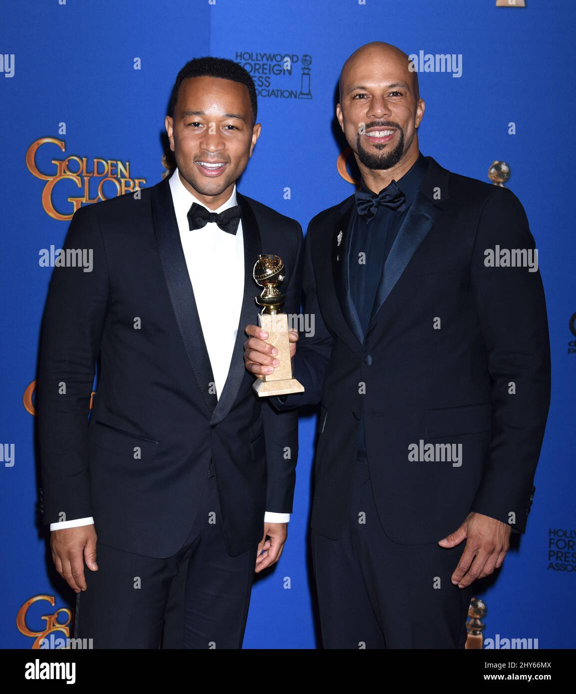 John Legend and Common in the press room for the 72nd Annual Golden ...