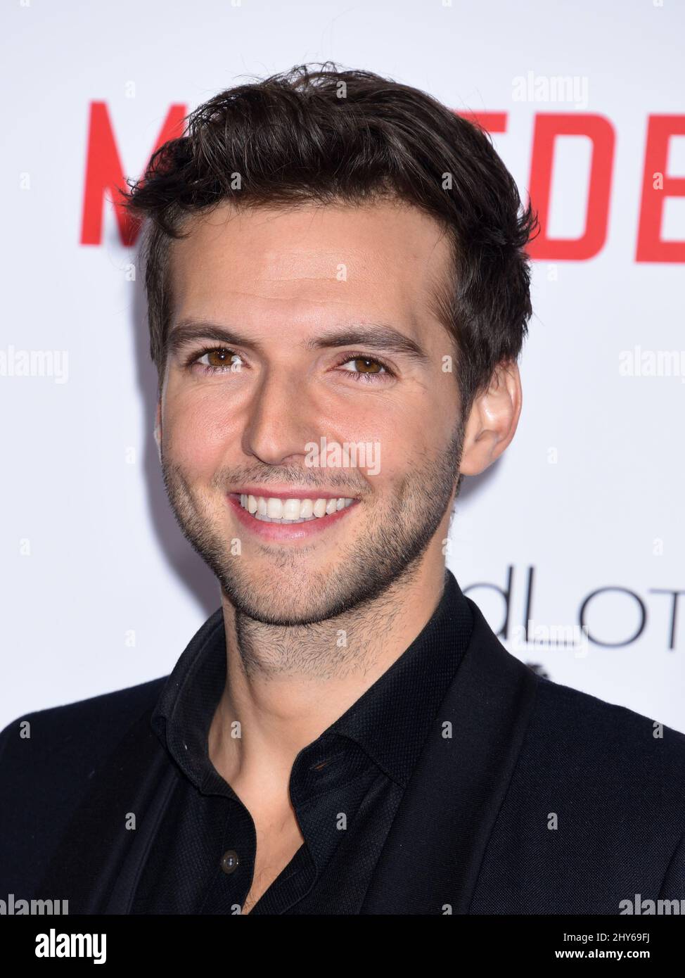 Guy Burnet attending the premiere of "Mortdecai" in Los Angeles ...