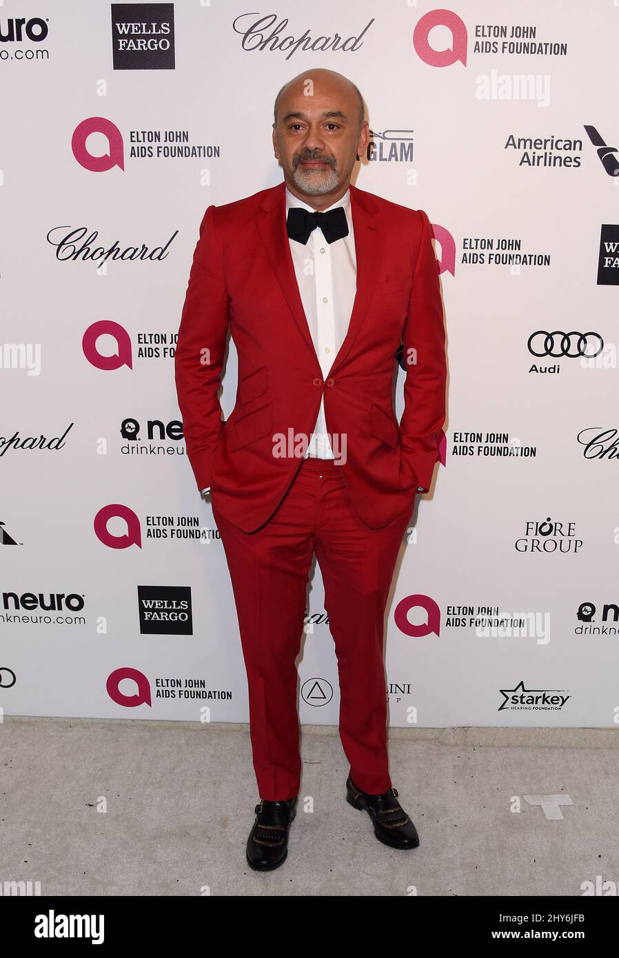 Christian Louboutin attending the 2015 Elton John AIDS Foundation ...