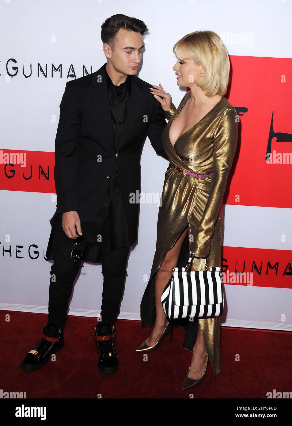 Pamela Anderson, Brandon Thomas Lee attending "The Gunman" Los Angeles ...