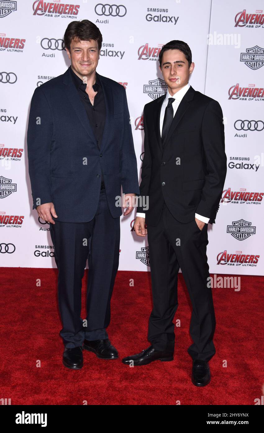 Nathan Fillion and Jake Moretz arriving for the premiere of Avengers ...