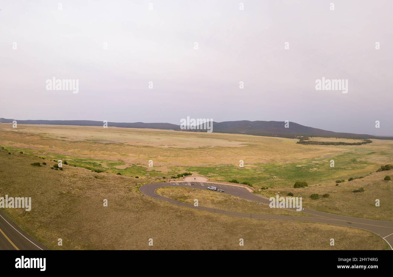 Road passing through smooth green field, Arizona, USA Stock Photo - Alamy
