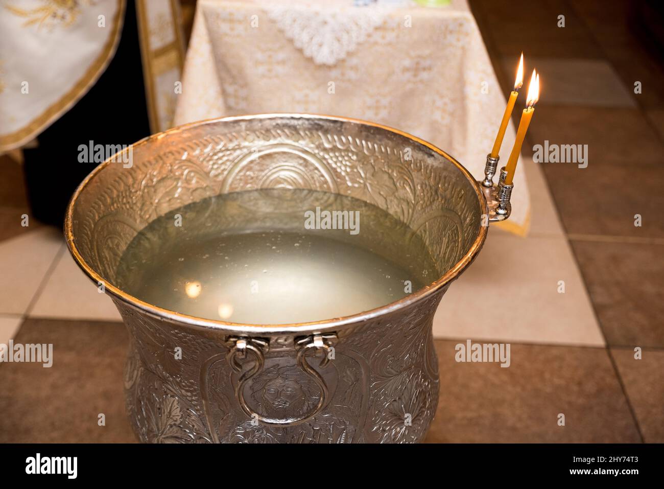 A decorative basin of holy water in a church Stock Photo - Alamy