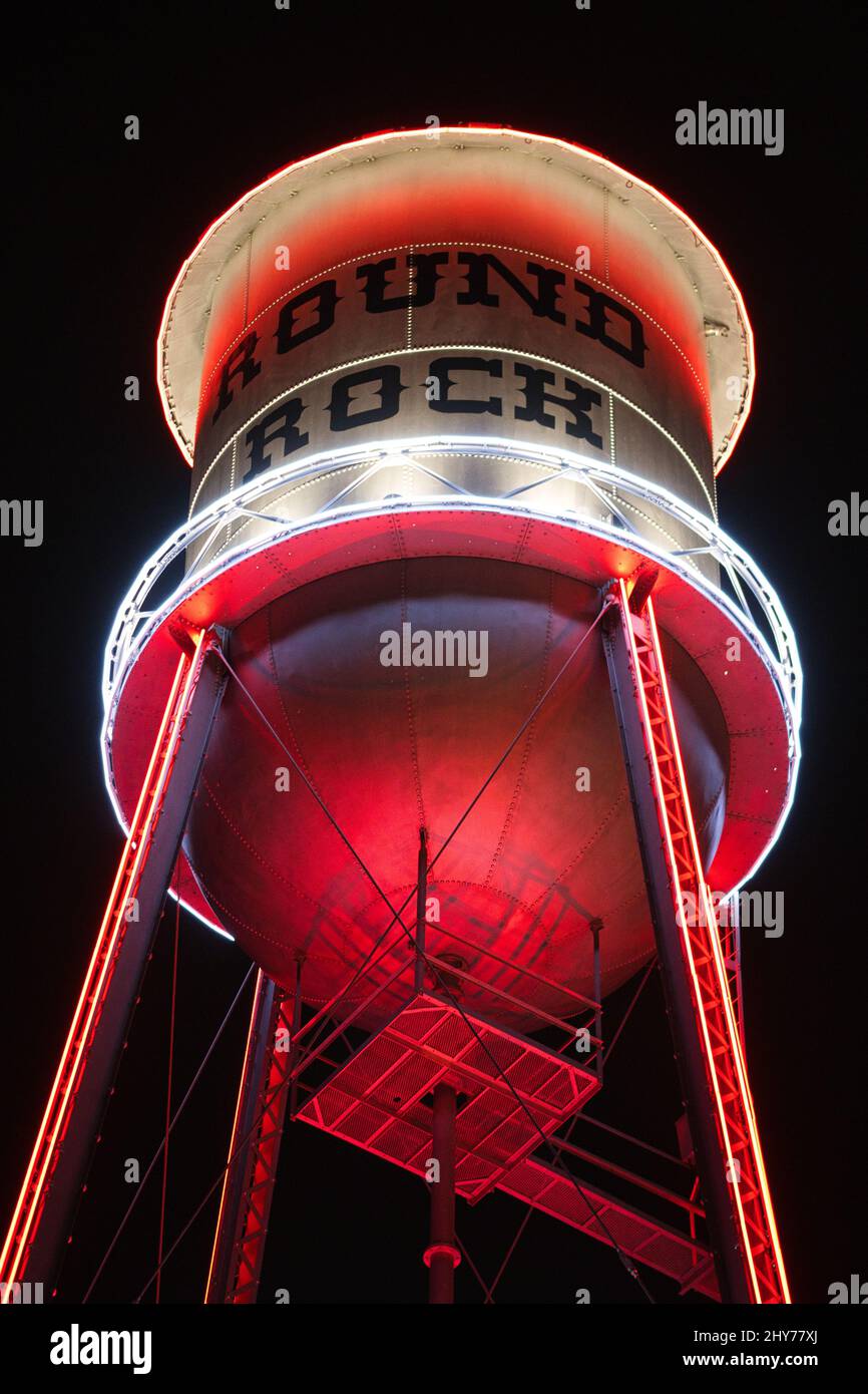 Low-angle shot of a water tower isolated on a black background in Round ...