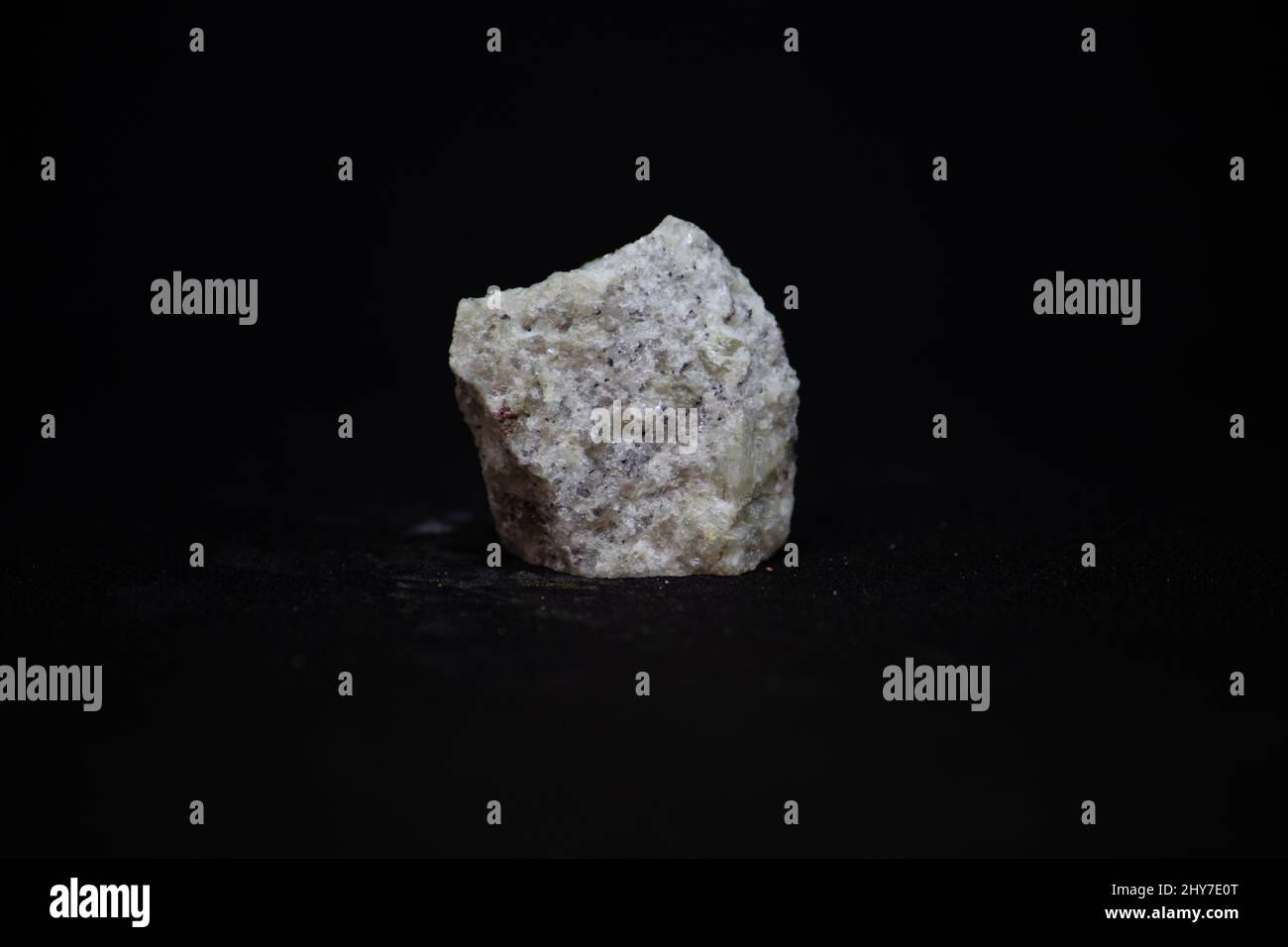Shot of a small expensive mineral on a black background Stock Photo - Alamy