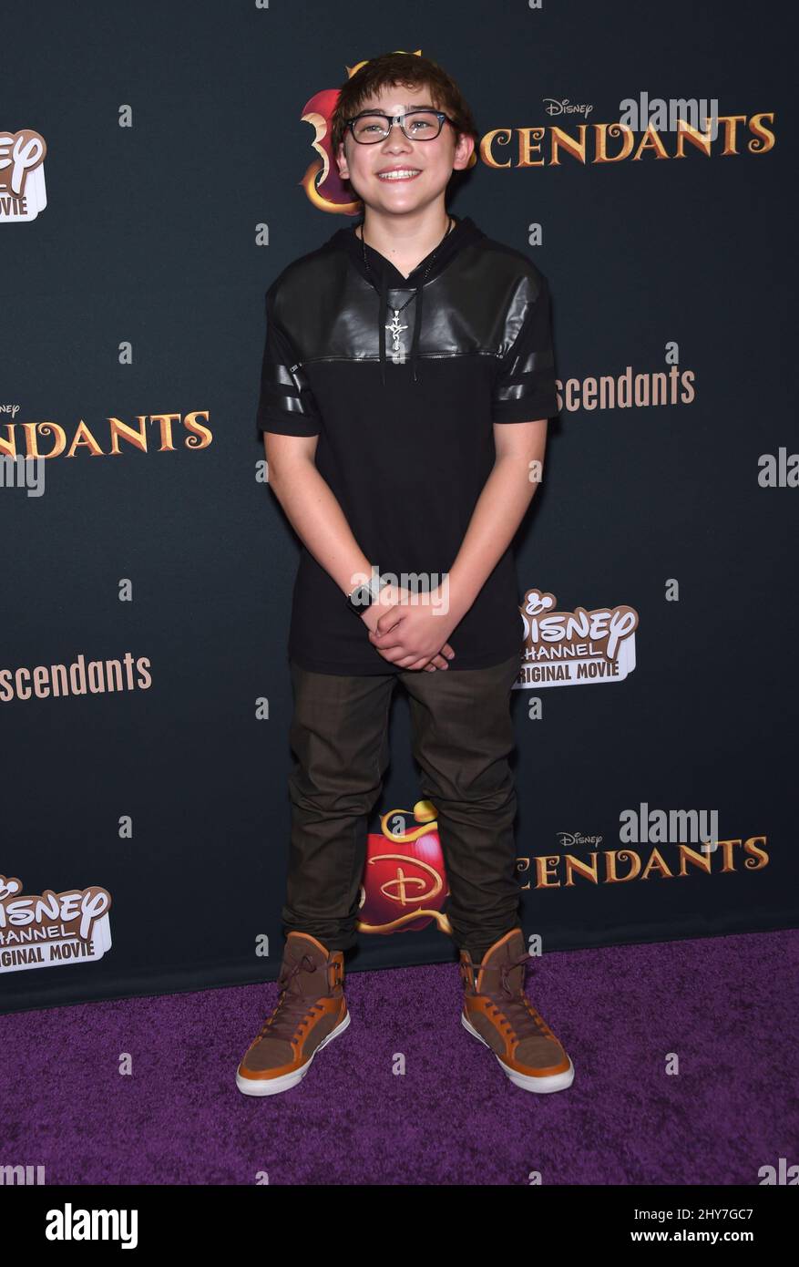 Raymond Ochoa attending the premiere of Descendants in Burbank ...