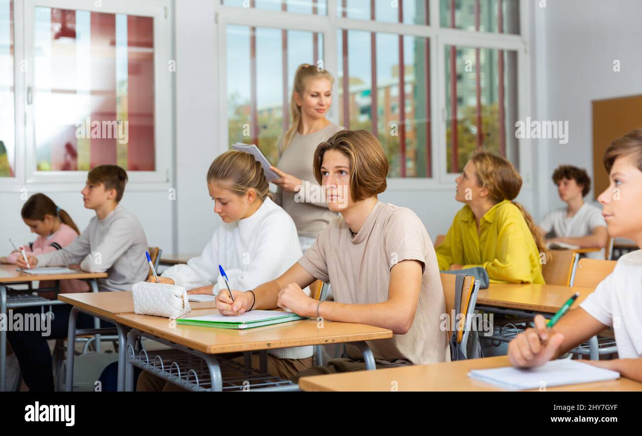 Student is sitting test and answer about task in classroom Stock Photo ...
