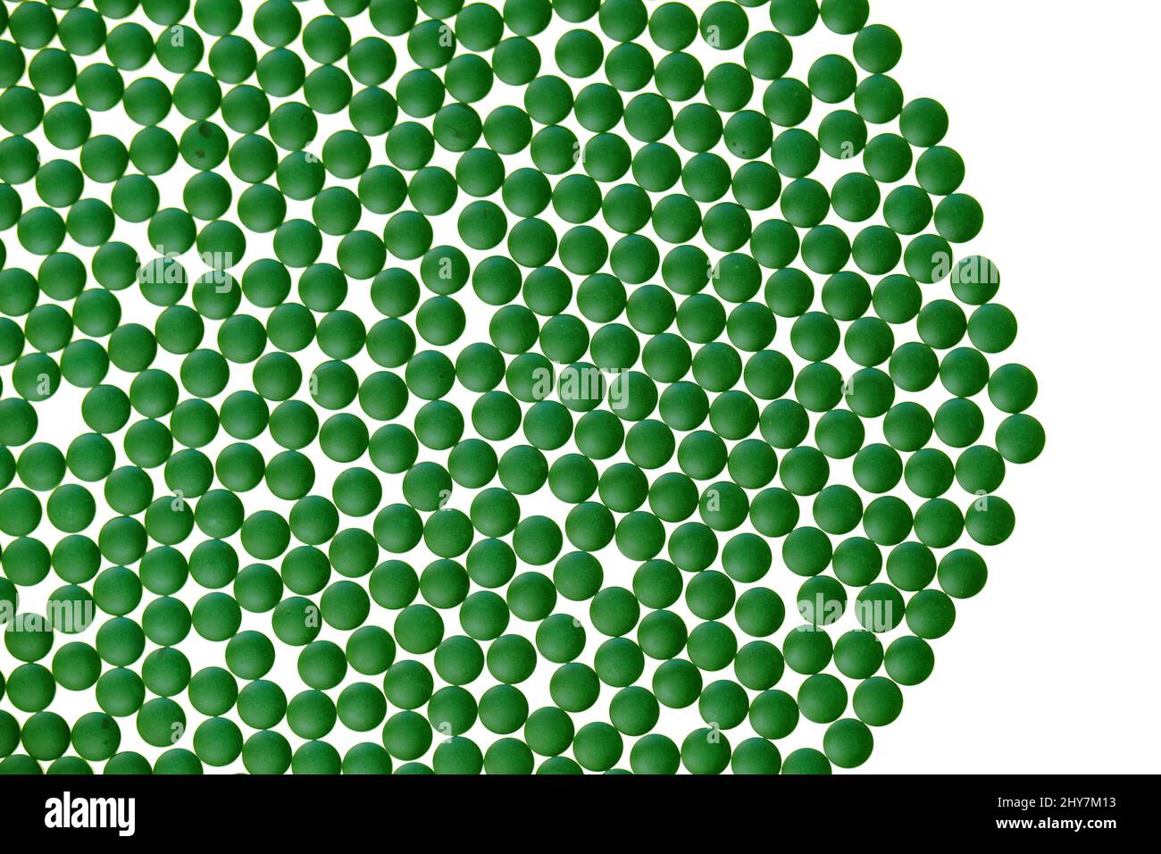 Spirulina algae. Chlorella algae green tablets isolated on white ...