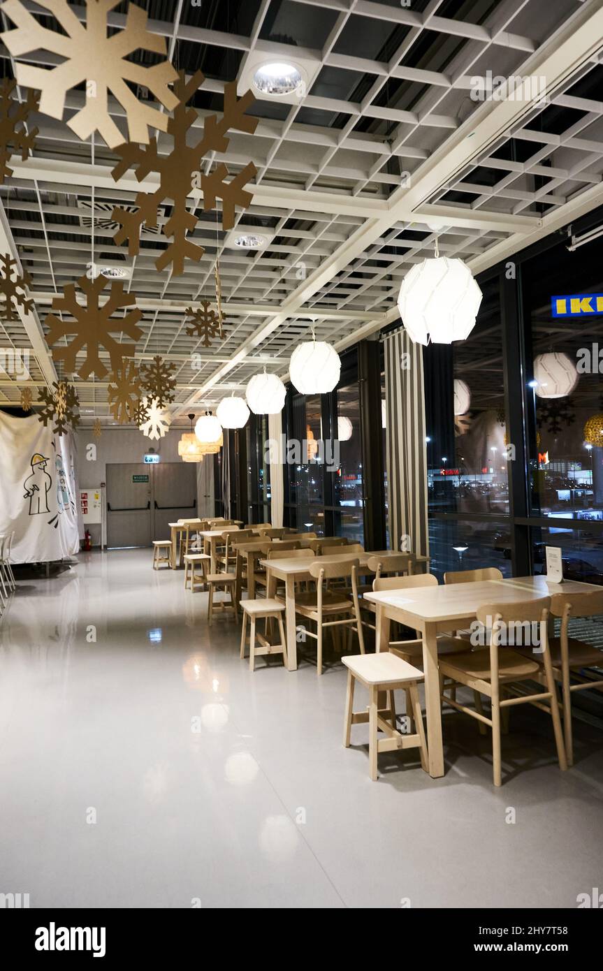 Row of empty chairs and tables of a restaurant in the Ikea furniture ...