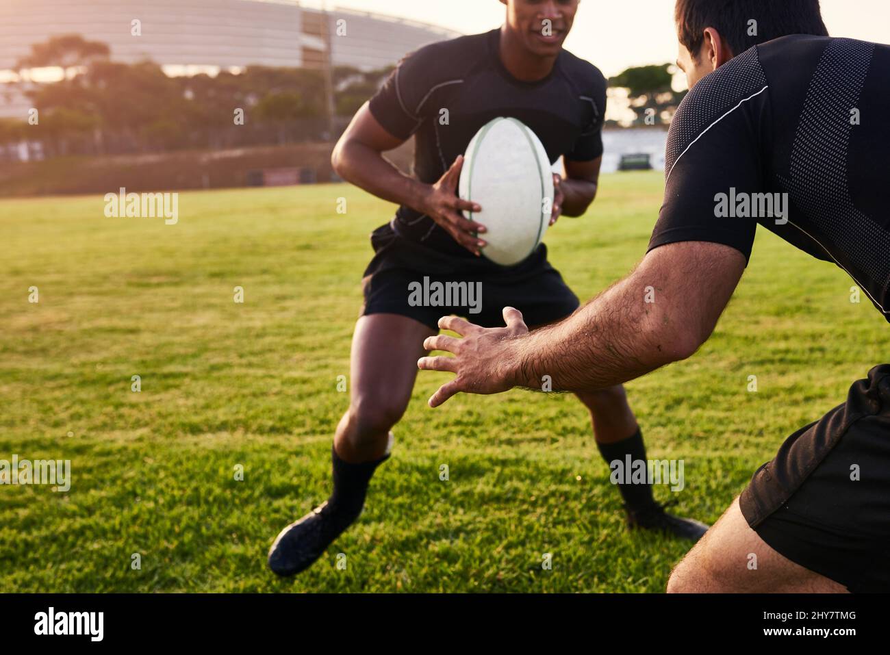 Tackle holding ball hi-res stock photography and images - Alamy