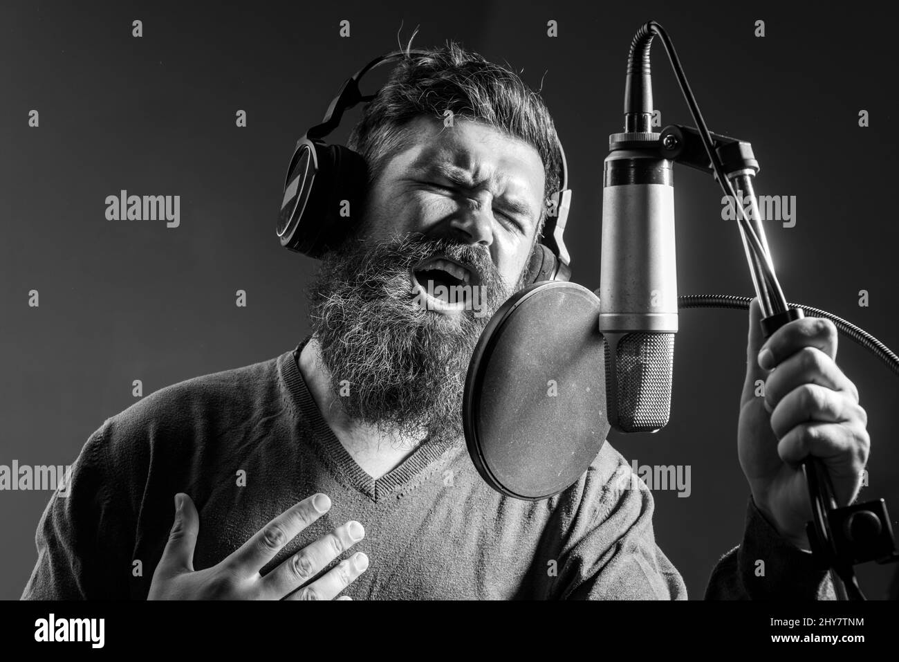 Portrait of man in recording studio. Expression face close up. Music ...