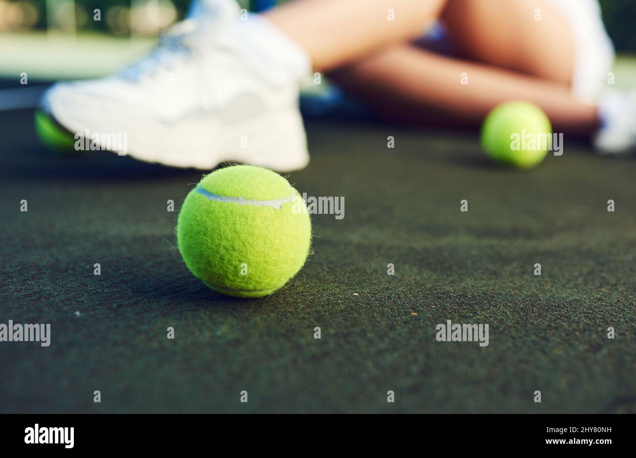 Grab a racket and ball and get playing. Closeup shot of a tennis ball ...