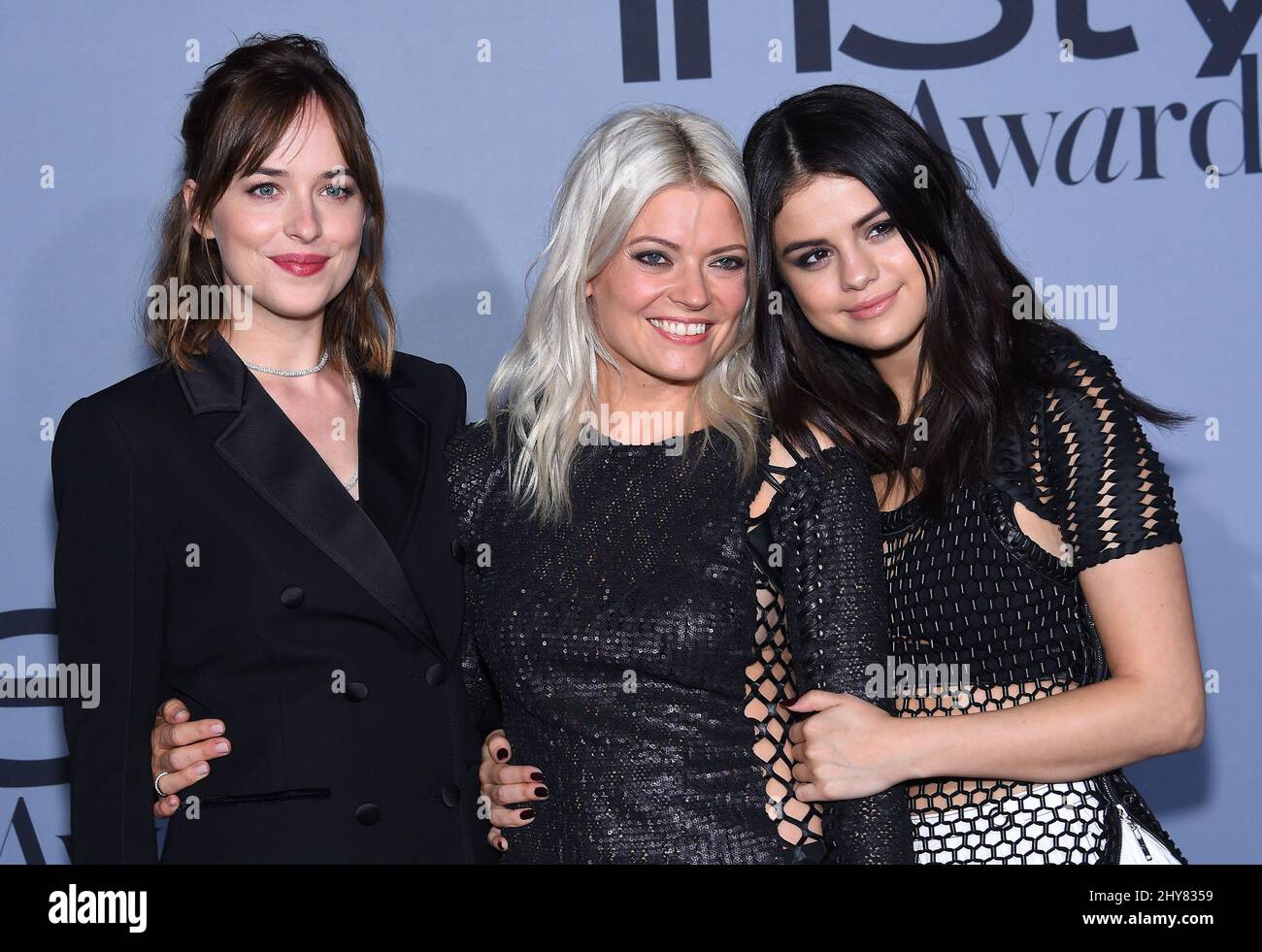 Dakota Johnson, Kate Young & Selena Gomez arriving to the InStyle ...