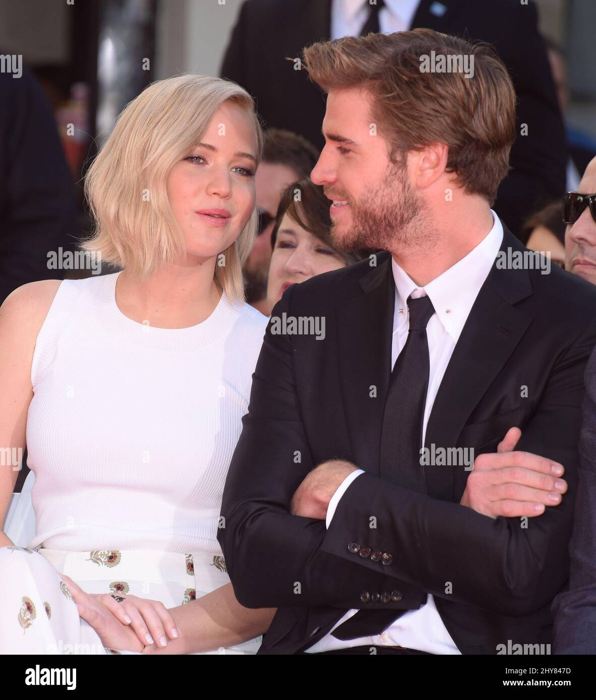 Jennifer Lawrence and Liam Hemsworth attending the "The Hunger Games ...