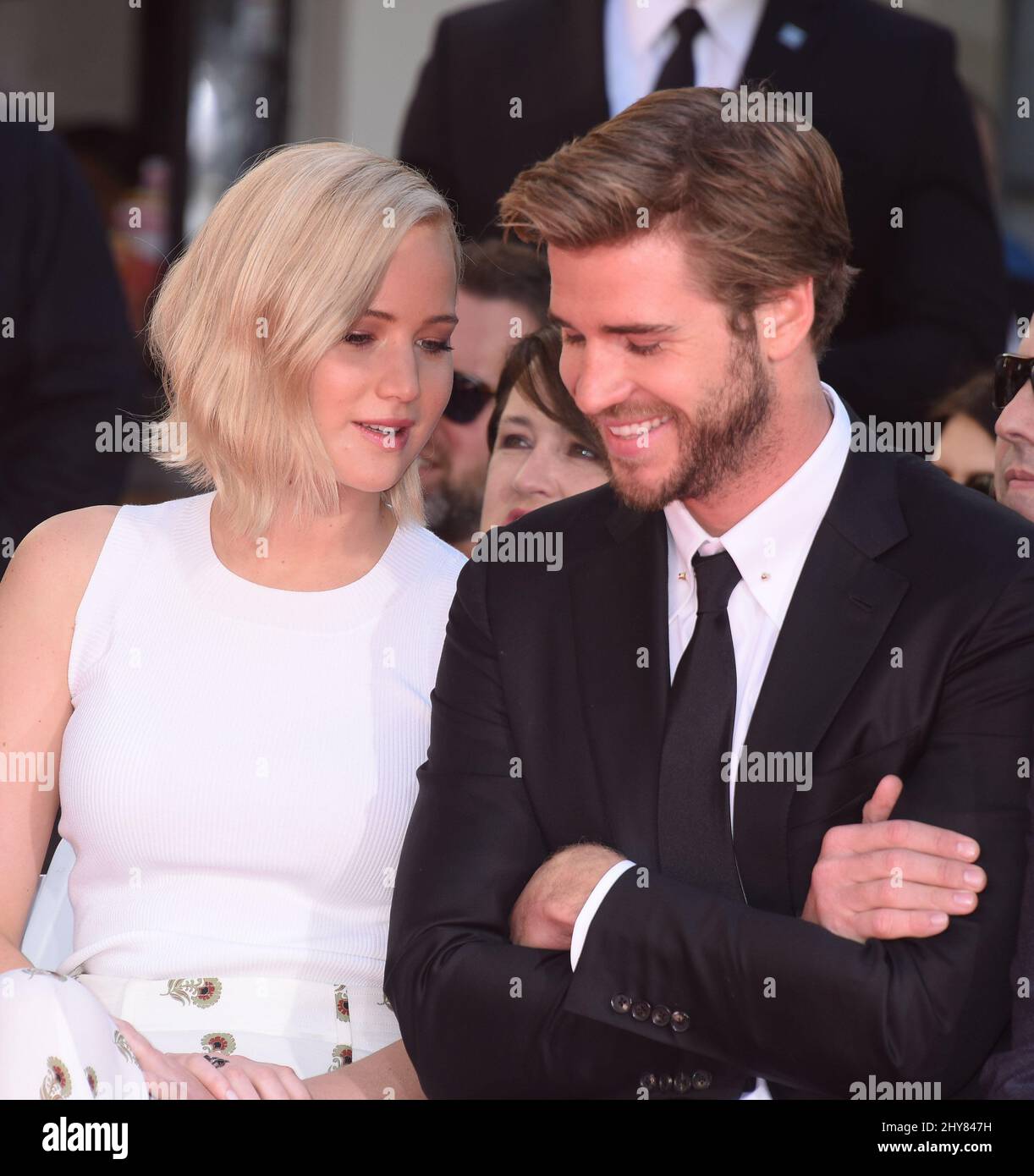 Jennifer Lawrence and Liam Hemsworth attending the "The Hunger Games ...