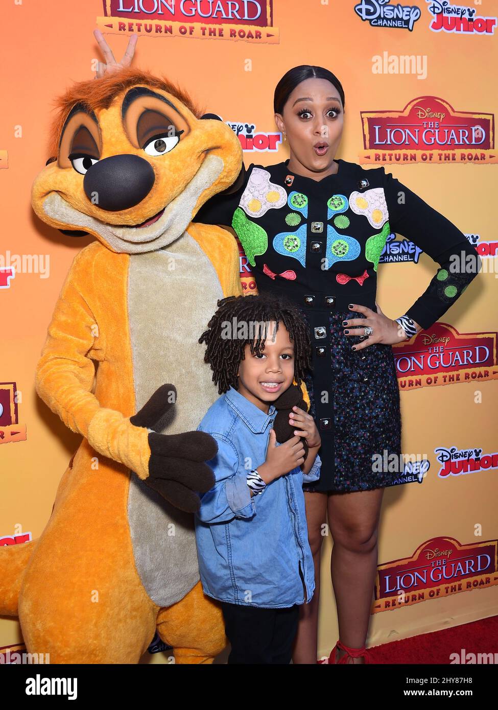 Tia Mowry & Cree Hardrict attending the premiere of Disney's "The Lion ...