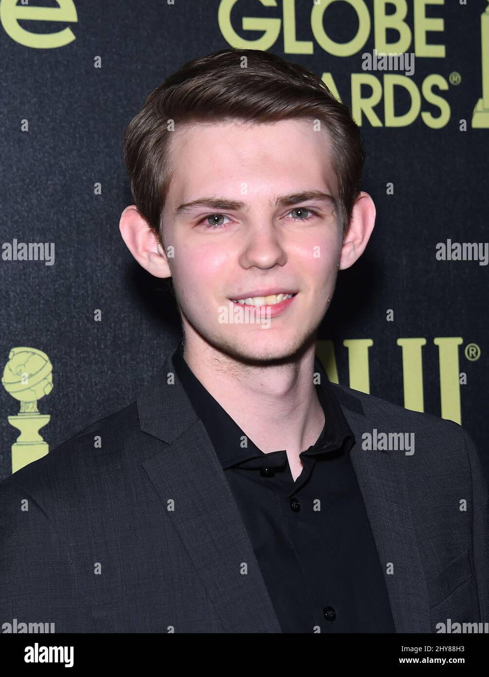 Robbie Kay attending the HFPA & InStyle Celebration of the 2016 Golden ...