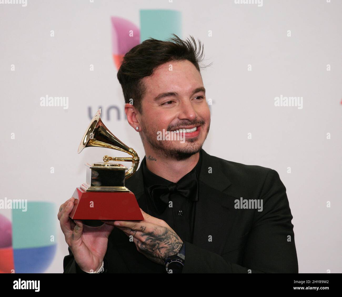 J Balvin poses in the press room at the 16th annual Latin Grammy Awards ...