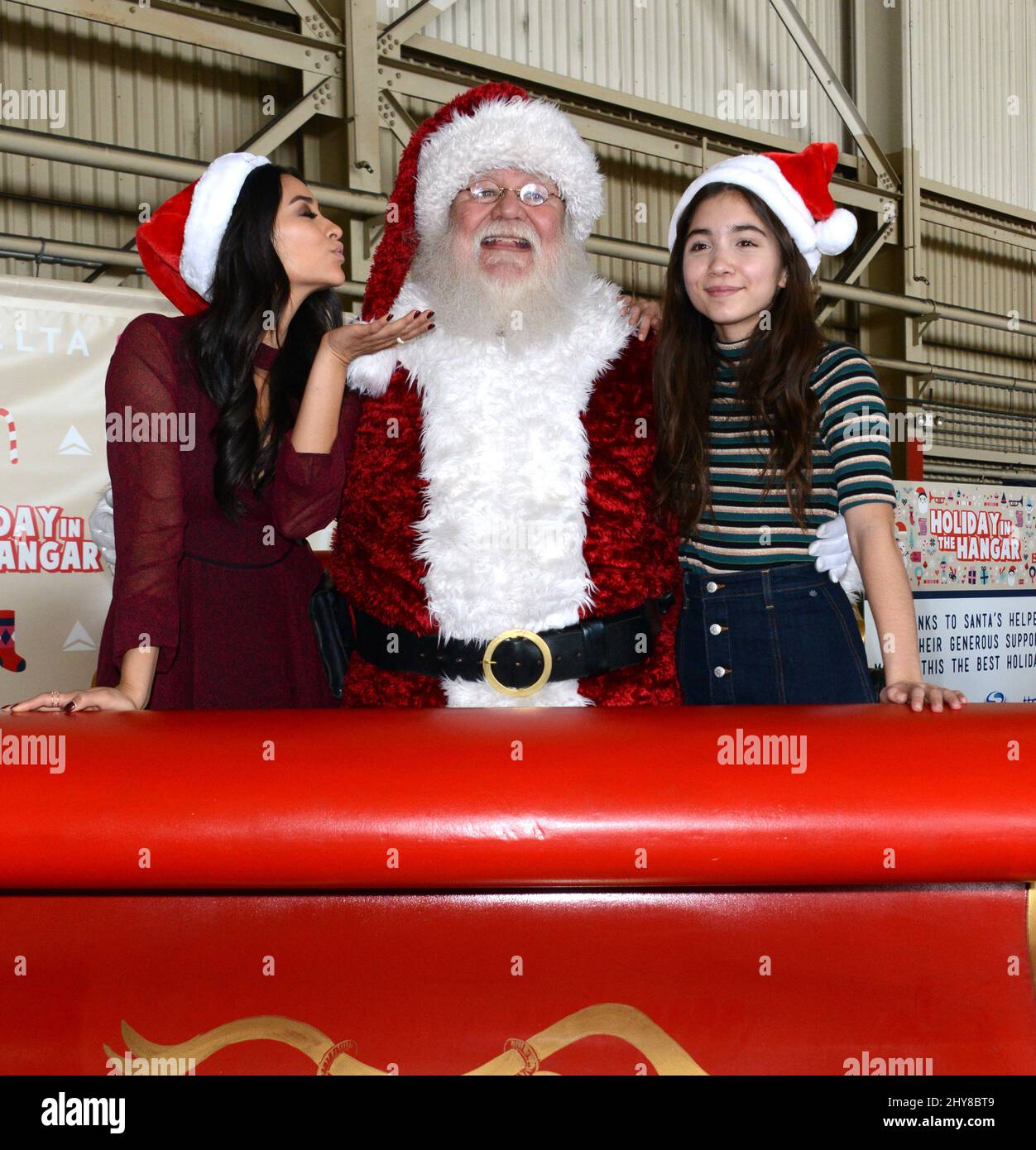 Shay Mitchell, Rowan Blanchard and Santa Claus as Delta Airlines hosts ...