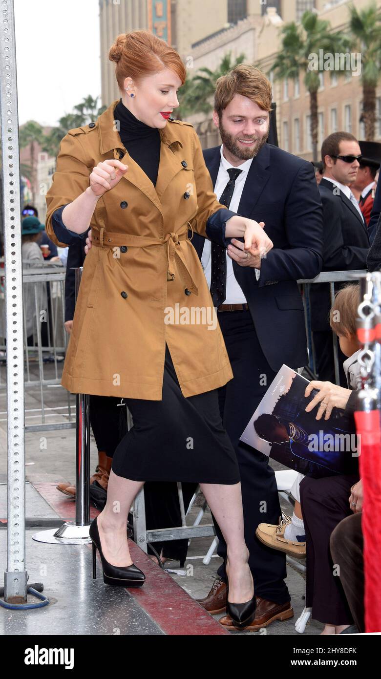 Bryce Dallas Howard and Seth Gabel attending the ceremony honouring Ron Howard with his 2nd star ...