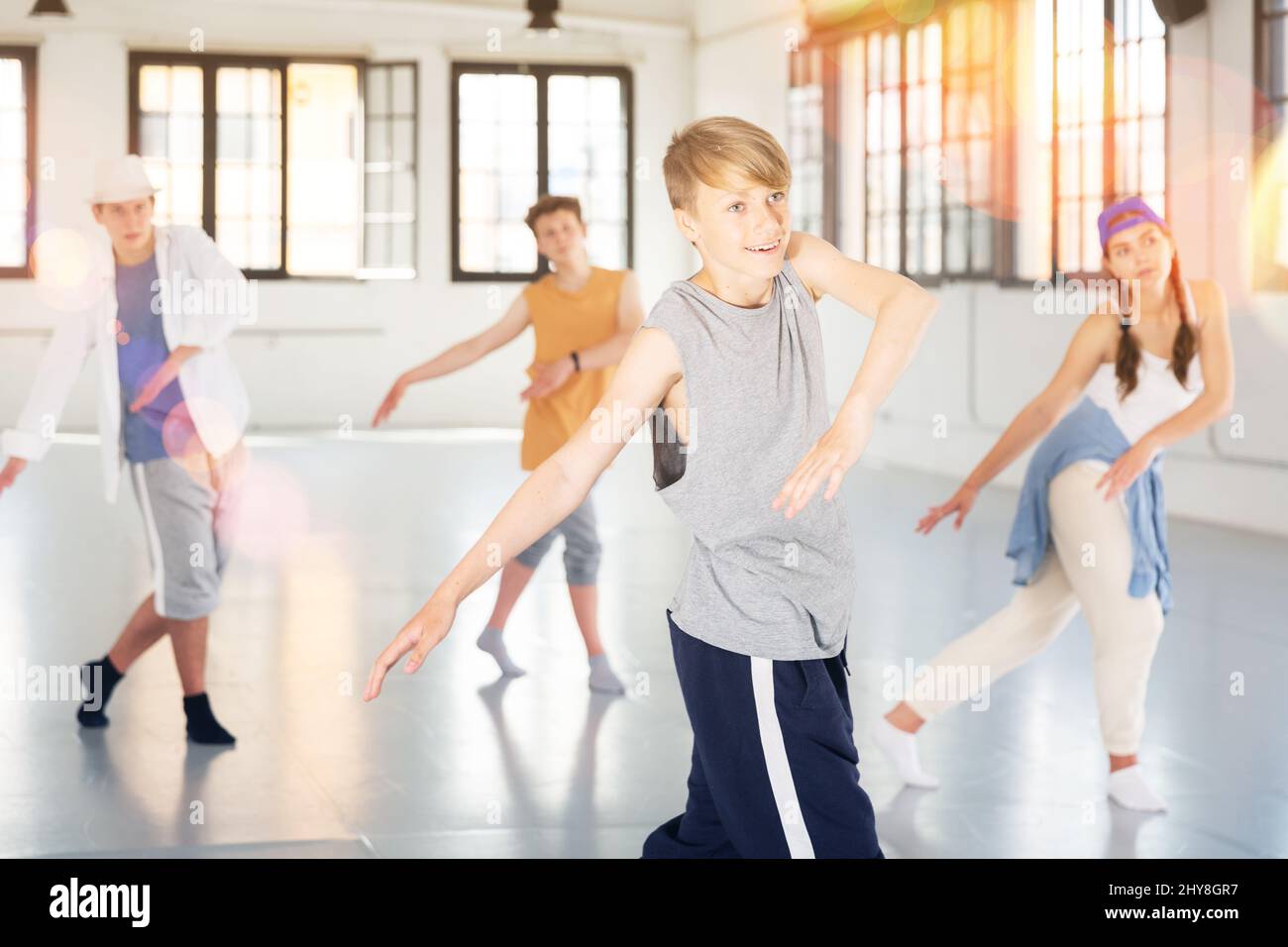 Teenage boy practicing active dance at studio Stock Photo - Alamy
