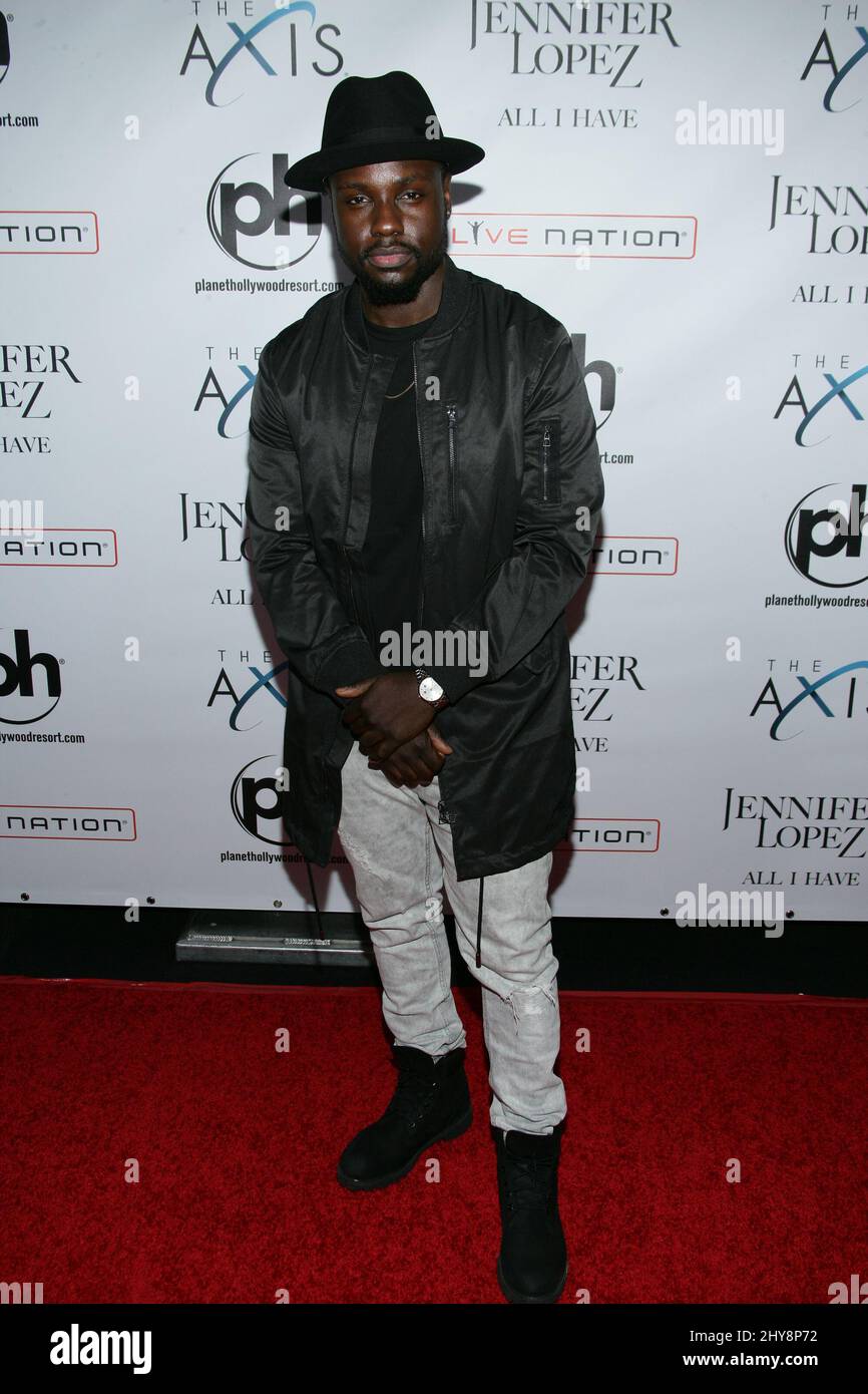 Dayo okeniyi attending grand opening jennifer lopez hi-res stock ...