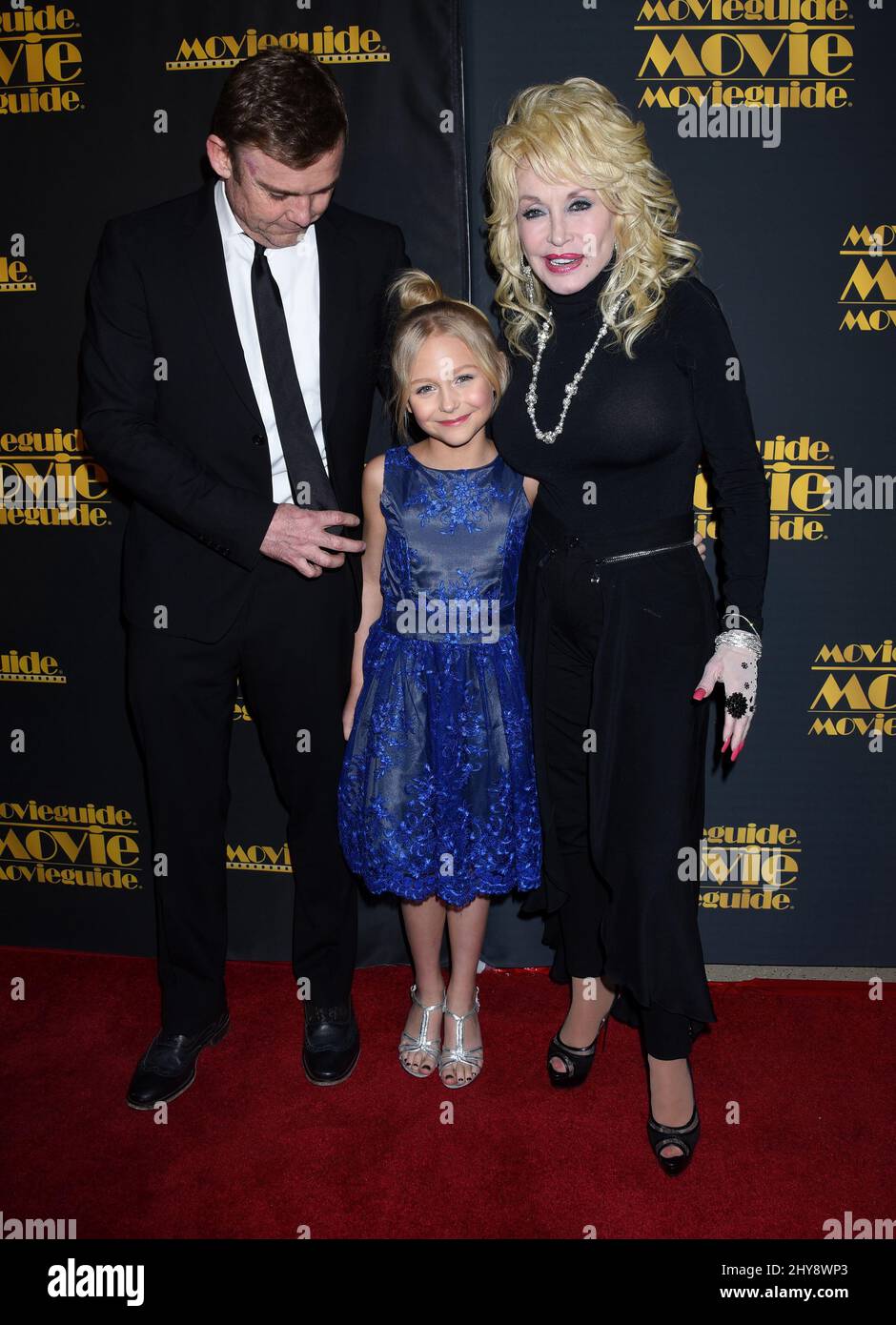 Ricky Schroder, Alivia Lyn Lind and Dolly Parton attending the 24th ...