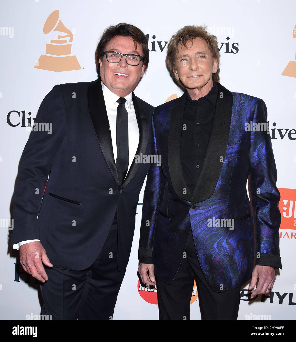 Barry Manilow and Garry Kief attends the 2016 Pre-GRAMMY Gala and ...