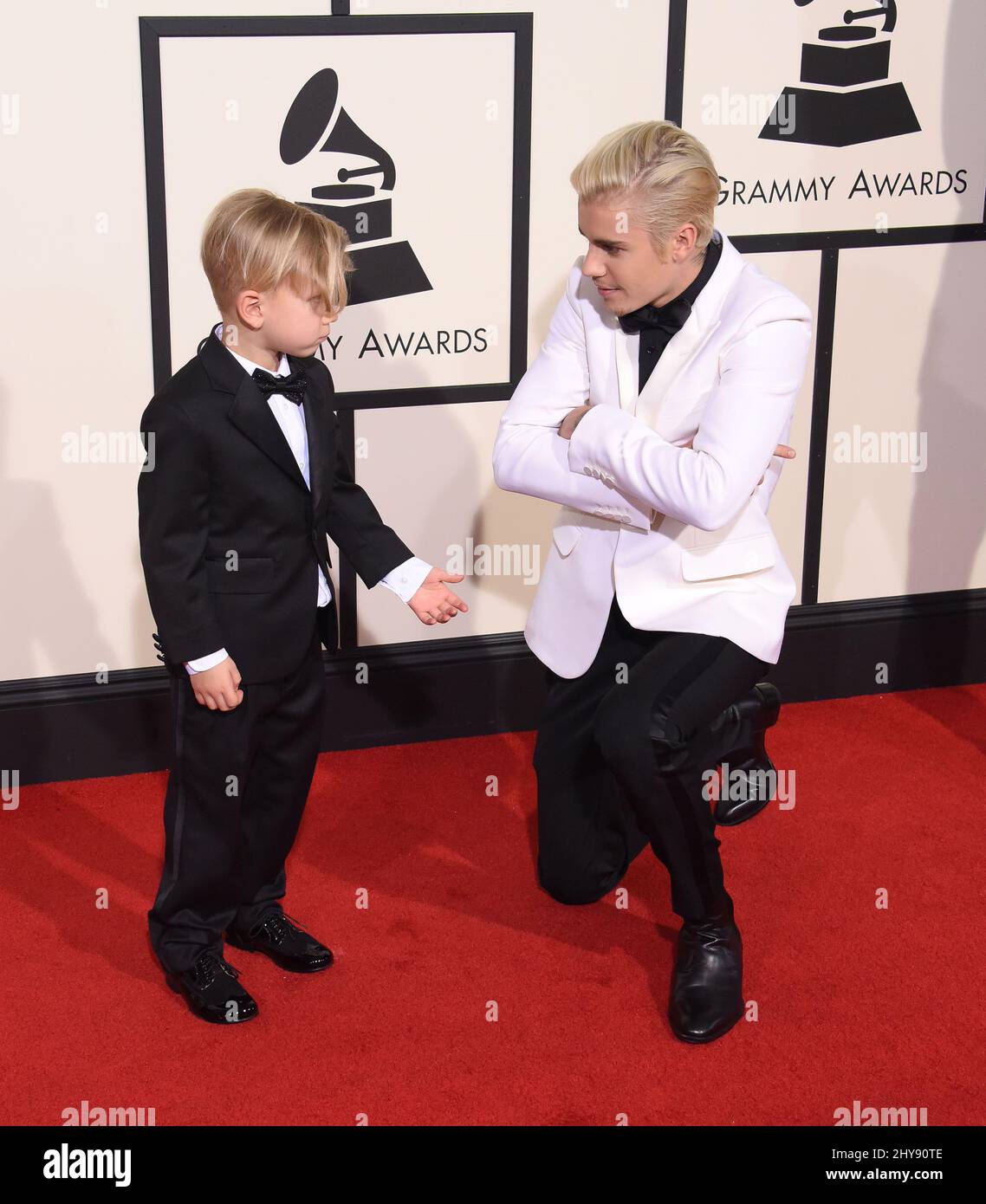 Justin Bieber, brother Jaxon arriving at the 58th Annual Grammy Awards ...