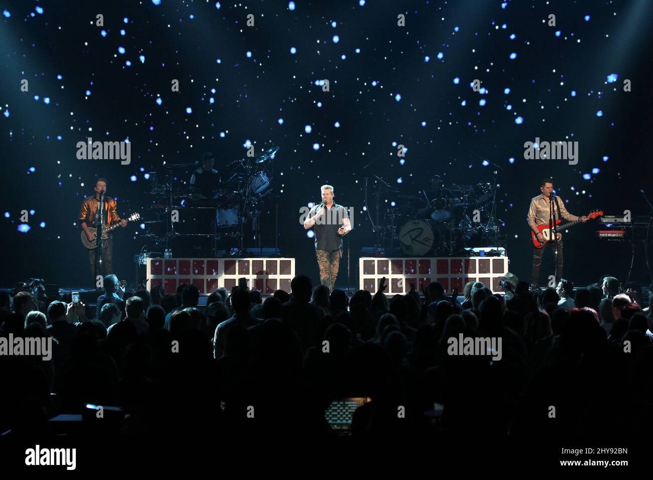 Joe Don Rooney, Gary LeVox, Jay DeMarcus of Rascal Flatts performs at ...