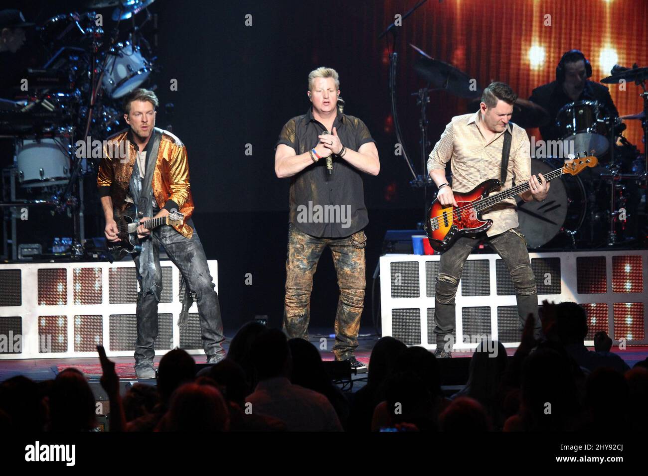 Joe Don Rooney, Gary LeVox, Jay DeMarcus of Rascal Flatts performs at ...