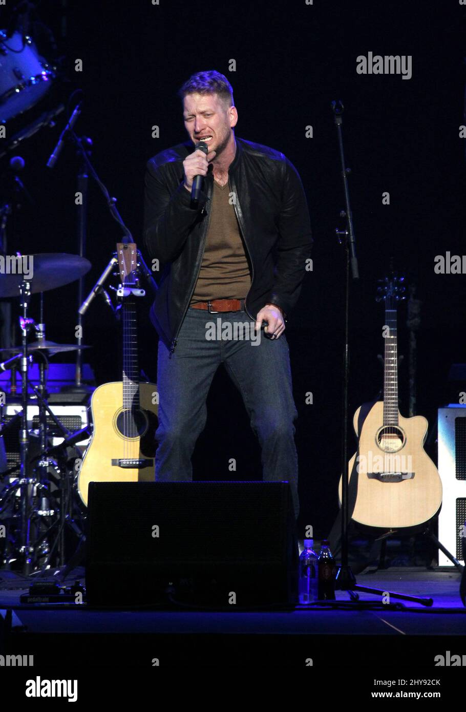 Barrett Baber performs at the Rascal Flatts Rhythm & Roots Concert at ...