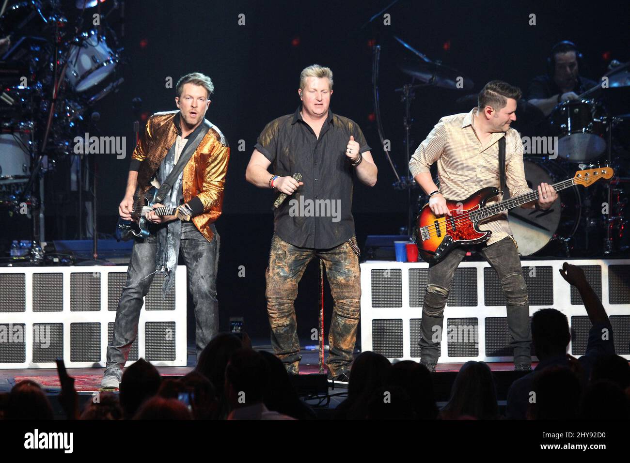 Joe Don Rooney, Gary LeVox, Jay DeMarcus of Rascal Flatts performs at ...