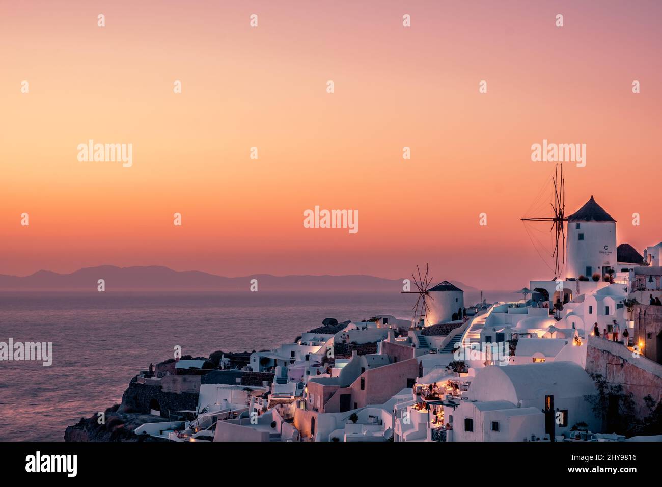 Beautiful sunset from a touristic Greek island Santorini Stock Photo ...