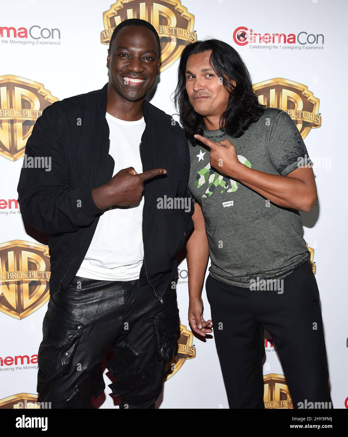 Adewale Akinnuoye-Agbaje & Adam Beach attending the Warner Brothers ...