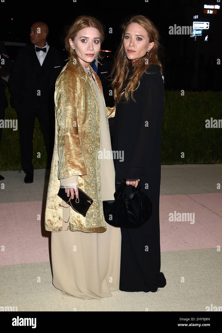 Mary-Kate Olsen & Ashley Olsen attending the Costume Institute Benefit ...