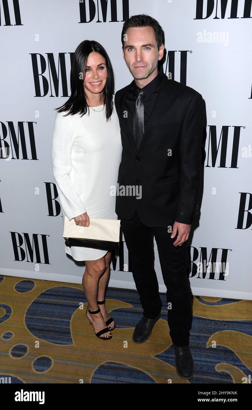 Courteney Cox and Johnny McDaid attending The 64th Annual BMI Pop ...
