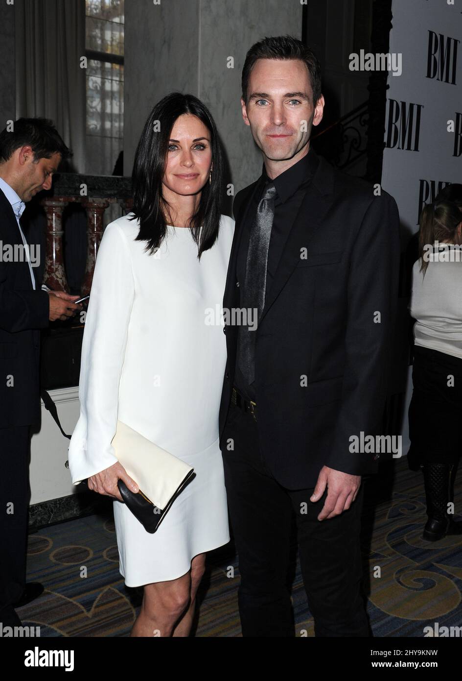 Courteney Cox and Johnny McDaid attending The 64th Annual BMI Pop ...