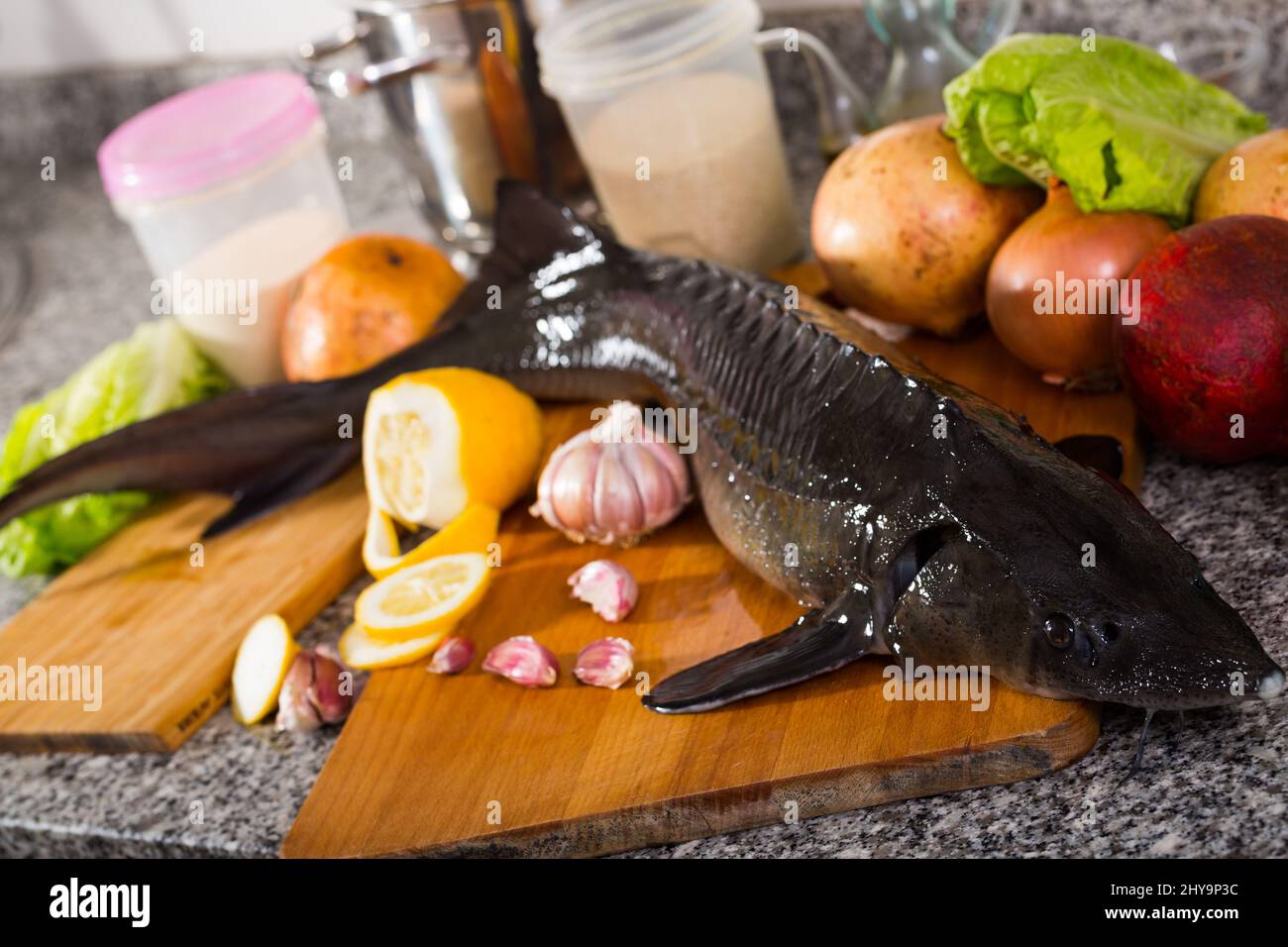 Sturgeon fish with fresh fruits and vegetables Stock Photo - Alamy