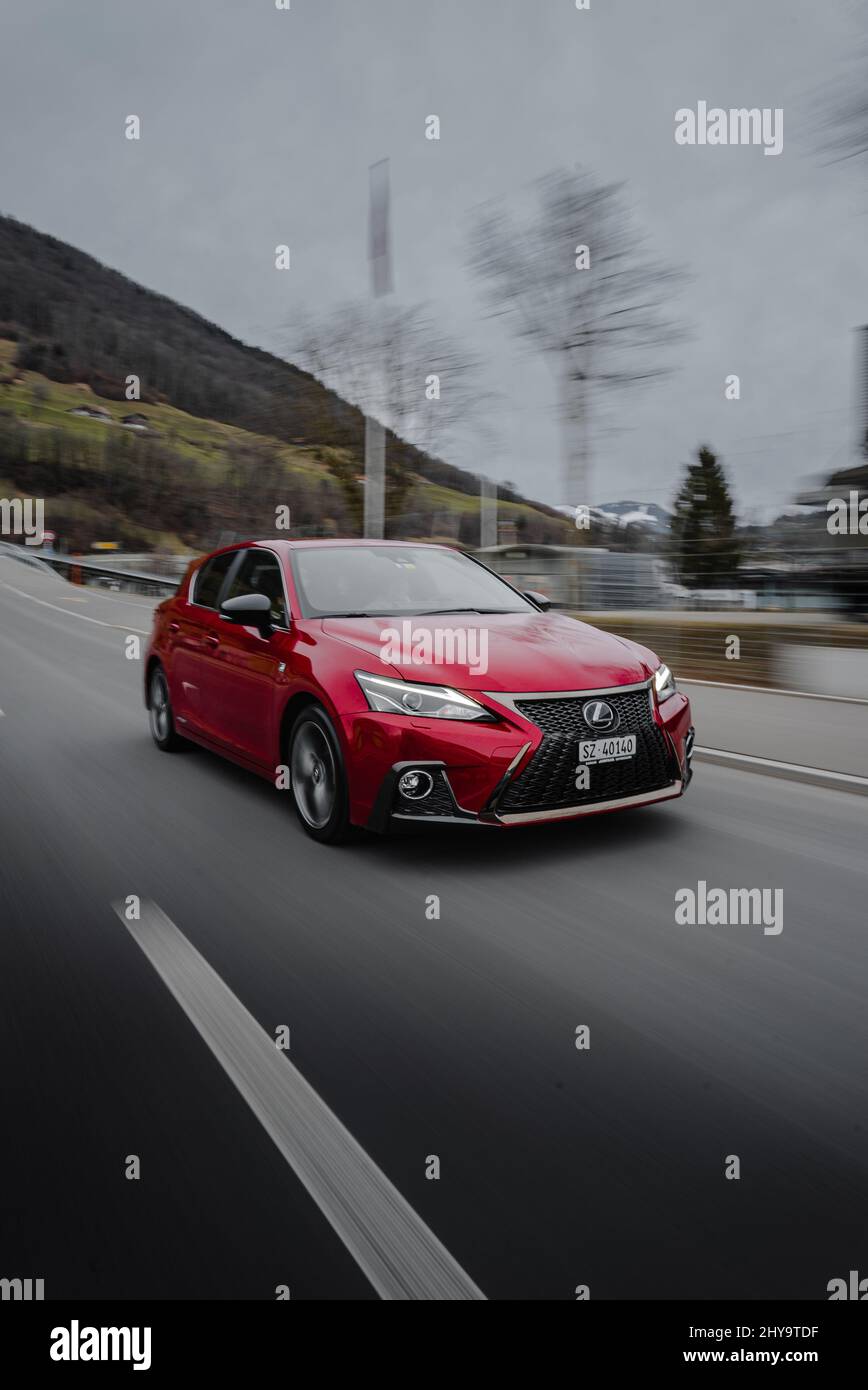 Red Lexus ct 200 on a road Stock Photo - Alamy