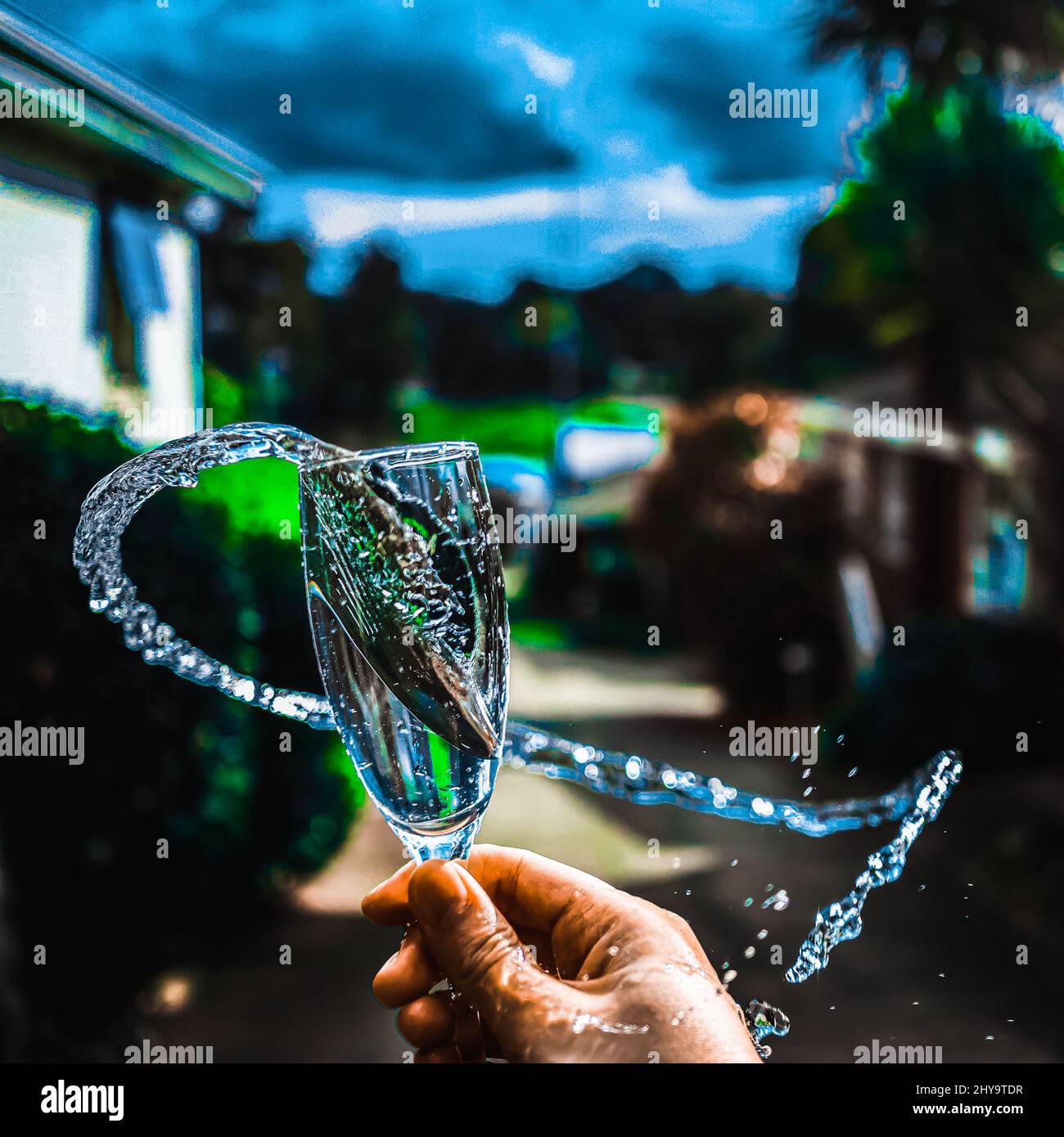 Person spilling water hi-res stock photography and images - Alamy