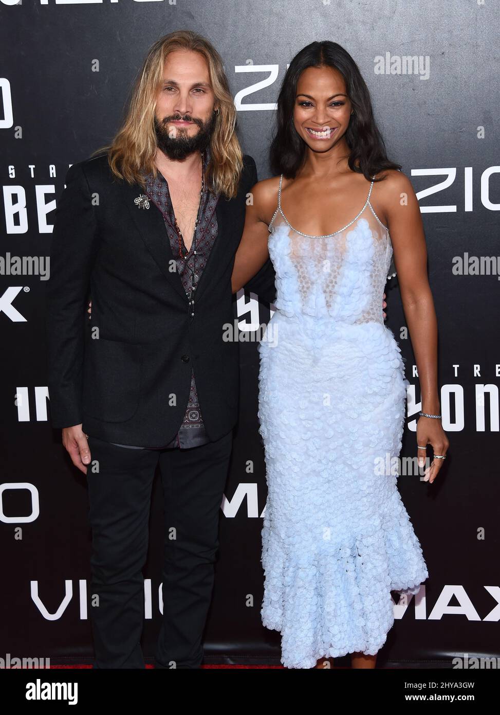 Zoe Saldana & Marco Perego attending the world premiere of "Star Trek ...
