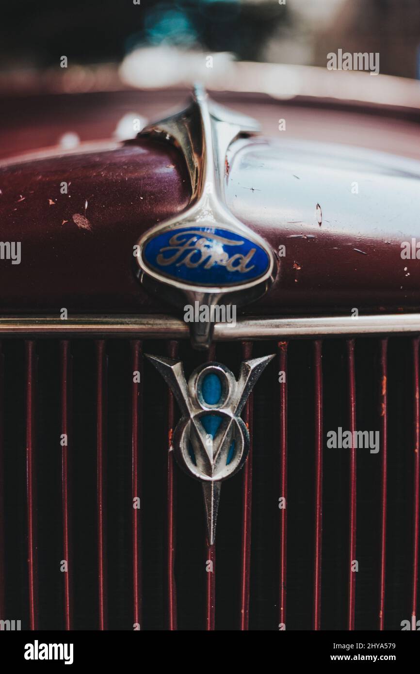 Closeup shot of the FORD logo on a really old vintage classic car Stock ...