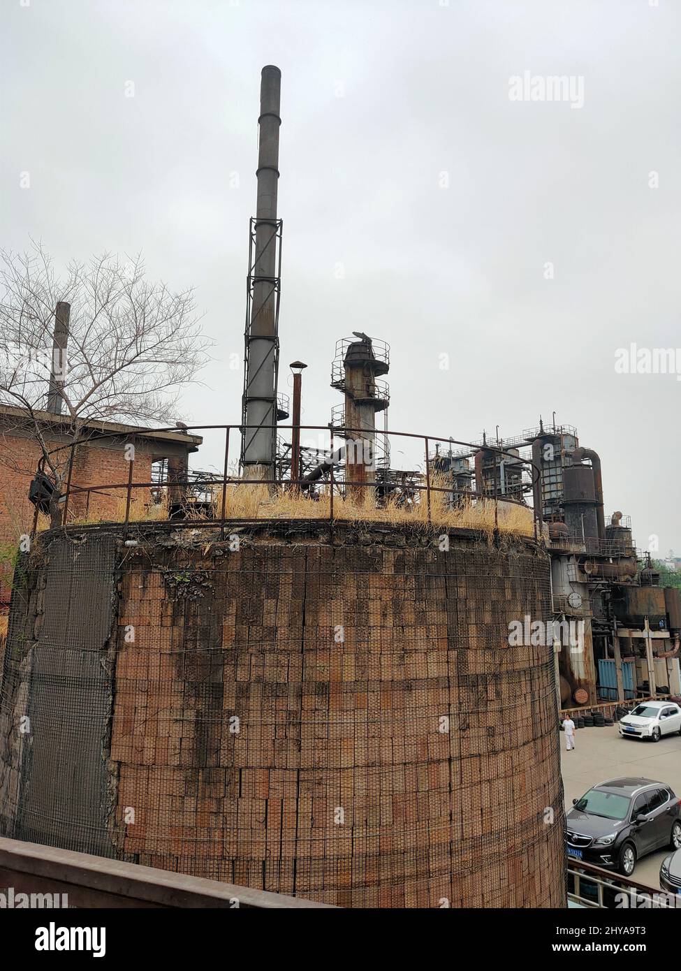 Vertical shot of an old factory Stock Photo - Alamy